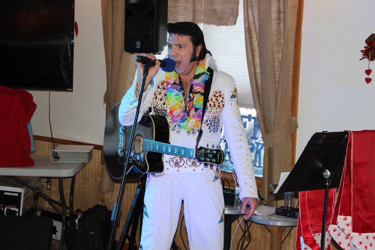 ELVIS IMPERSONATOR JEFF KRICK ENTERTAINS DURING DANCE PARTY AT WEST ...